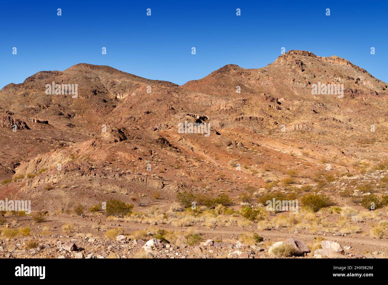 Southern Nevada desert mountain range with blue sky Stock Photo - Alamy