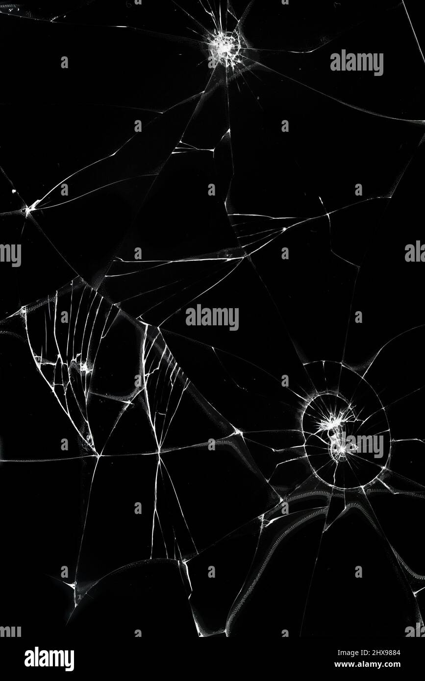 cracks on black glass background, broken abstract glass hole ...