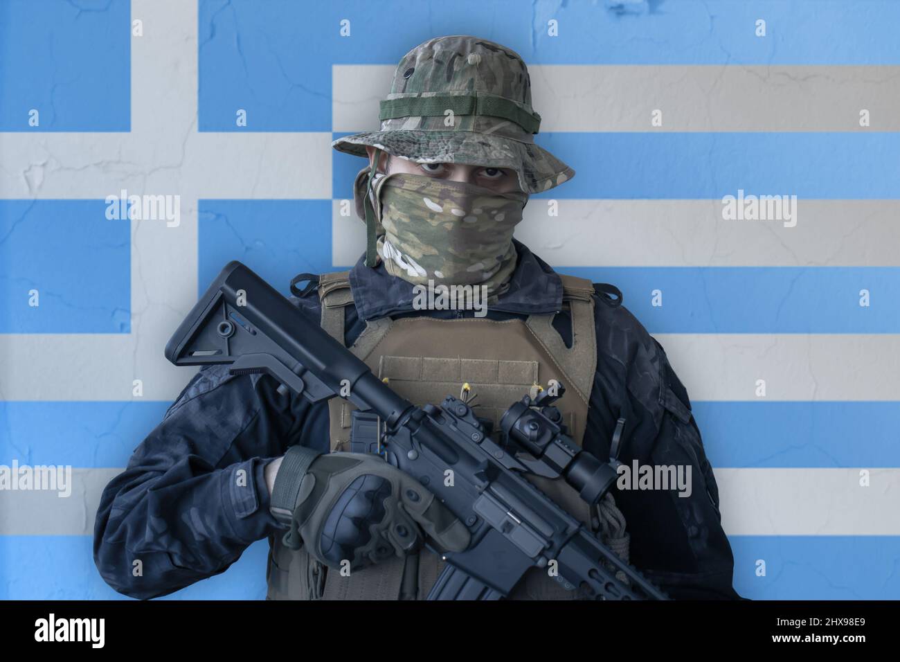 Angry greece soldier armed with rifle with greek flag as background ...