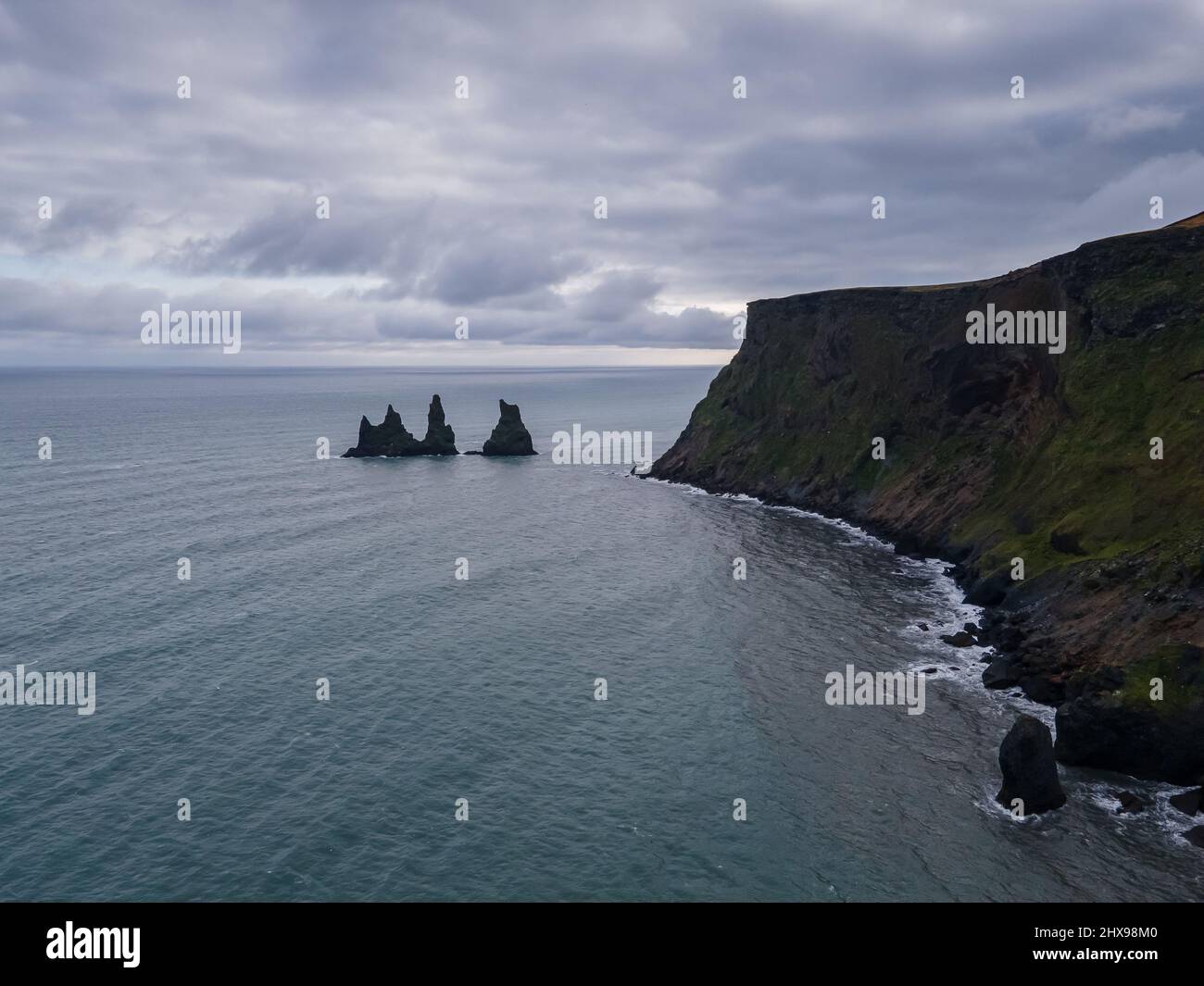 Beautiful aerial view of the famous Black Sand Beach and its Masive ...