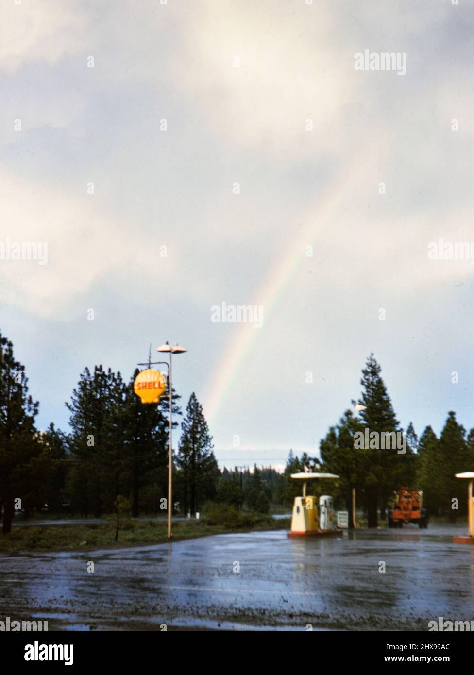 Rainbow in the sky above a Shell gas station ca. 1960 Stock Photo - Alamy