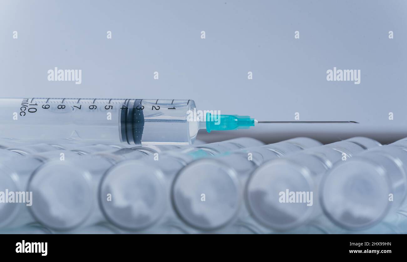 Medicine, Injection, vaccine and disposable syringe, drug concept ...