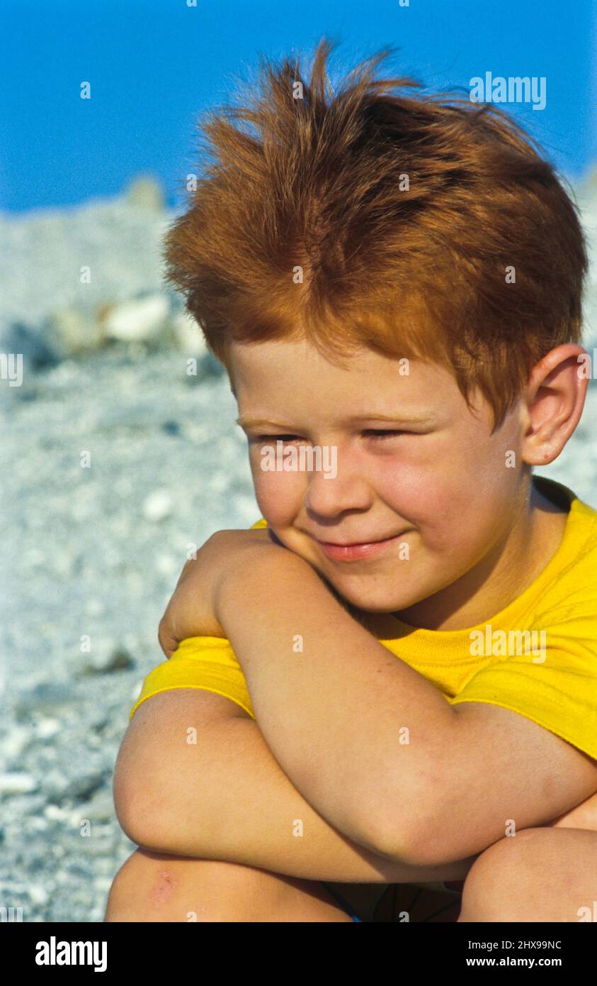 cute boy on a volcano tour in Italy on the stromboli Stock Photo - Alamy