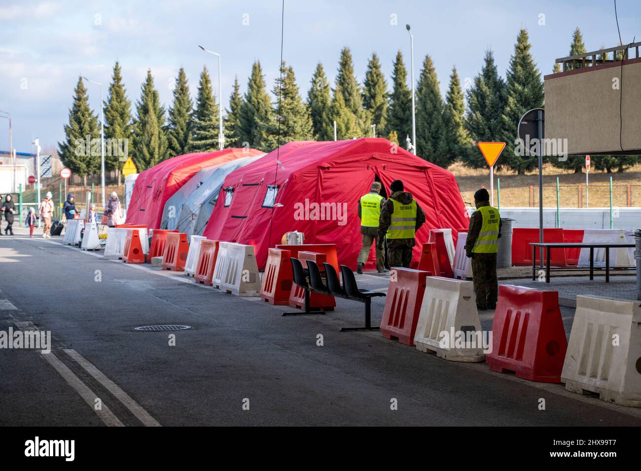 Korczowa, Poland. 10th Mar, 2022. Polish border guards are standing at ...