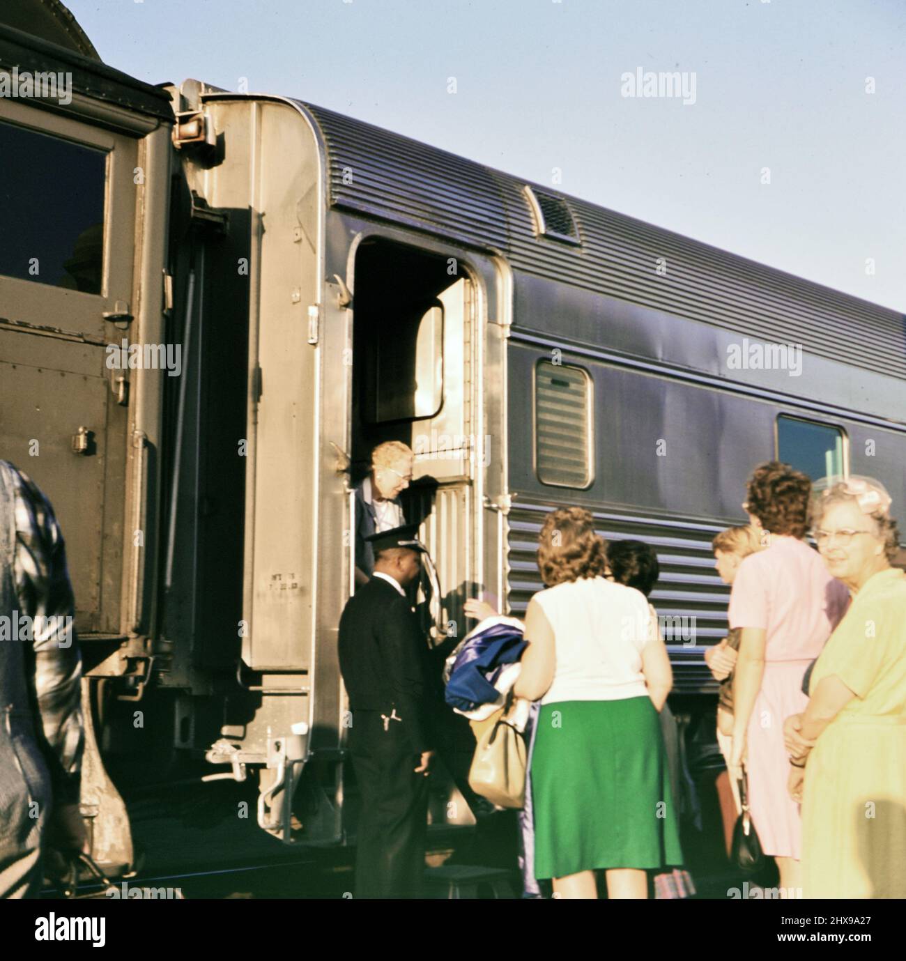 Passengers boarding a train in the 1960s ca. 1964 Stock Photo - Alamy