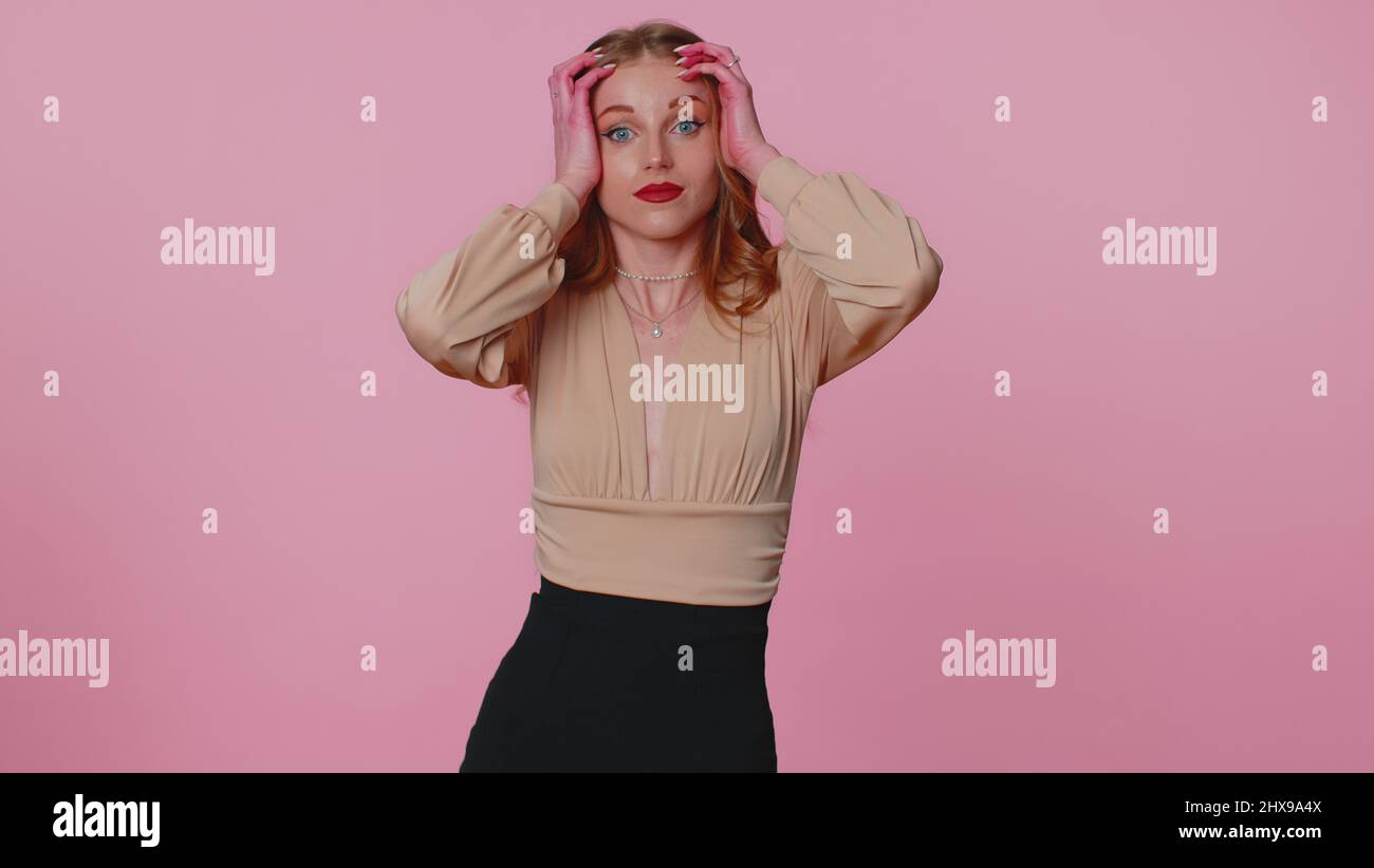 Excited amazed woman raising hands in shocked surprised wow showing ...