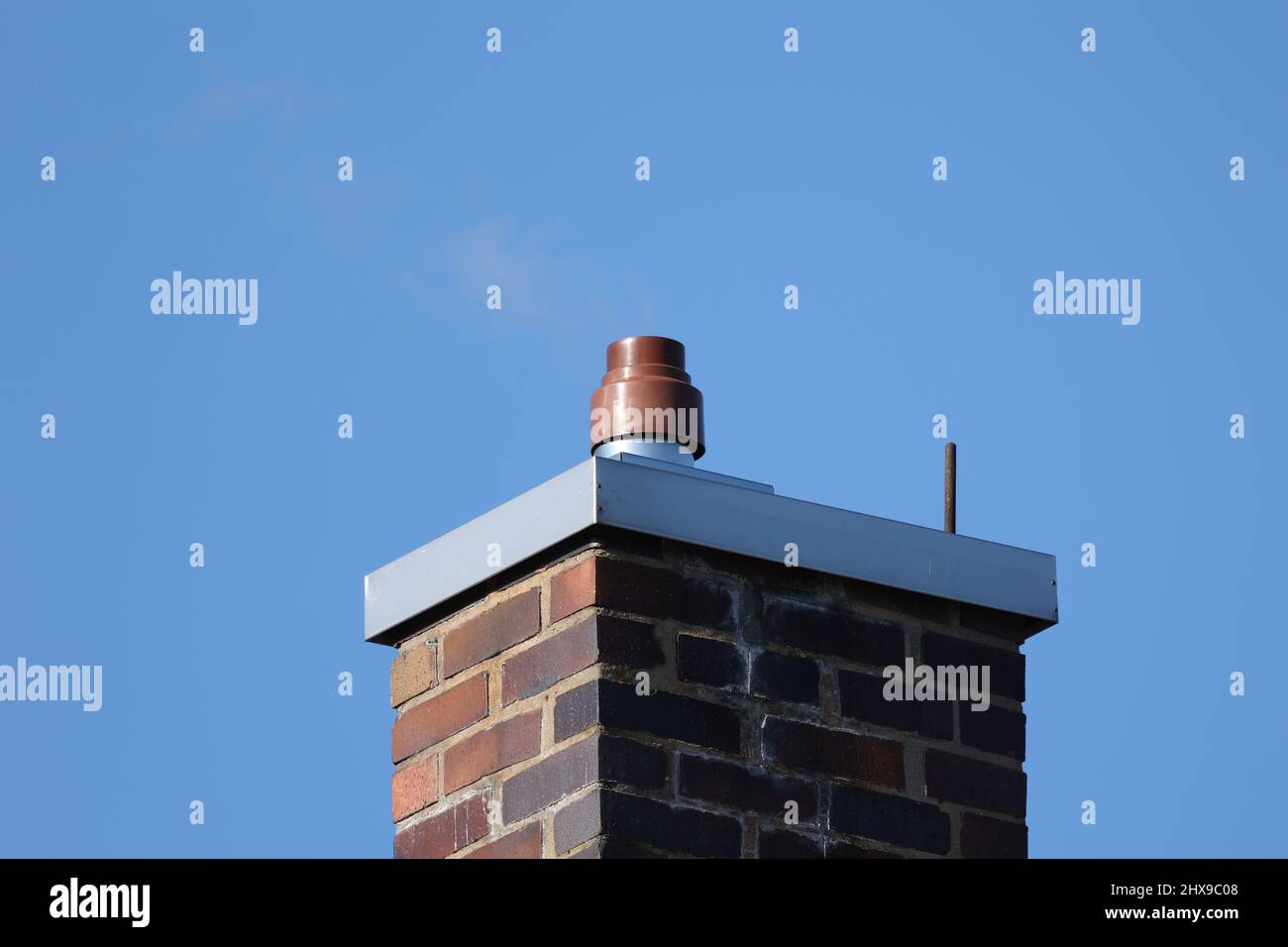 Small house brick chimney hi-res stock photography and images - Alamy