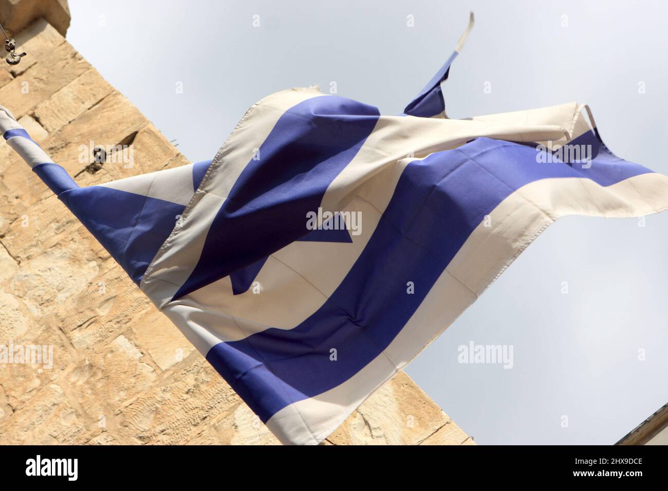 The flag of Israel in old Jerusalem Stock Photo - Alamy