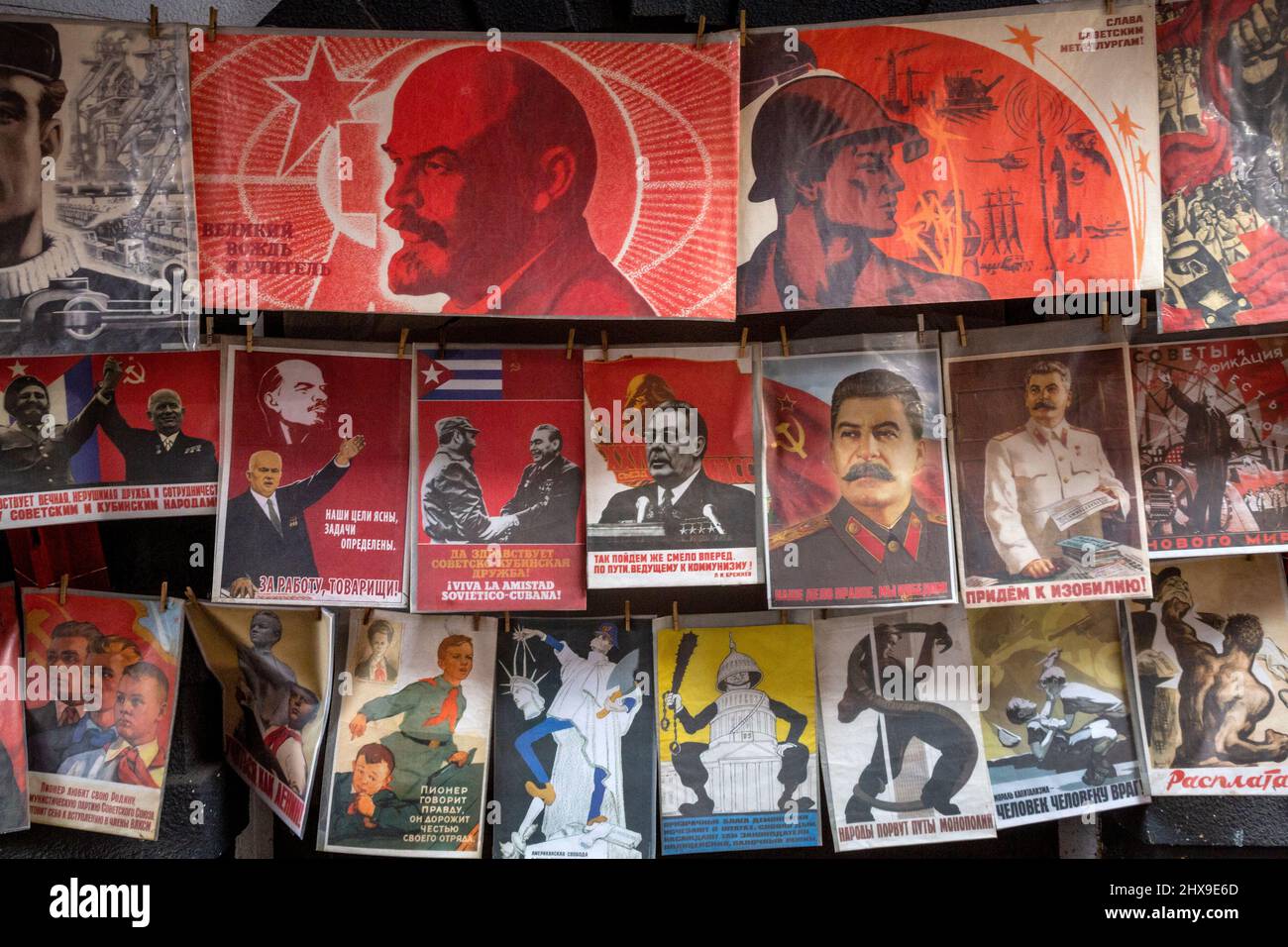 Soviet placards on a wall at a souvenir market on territory in the ...