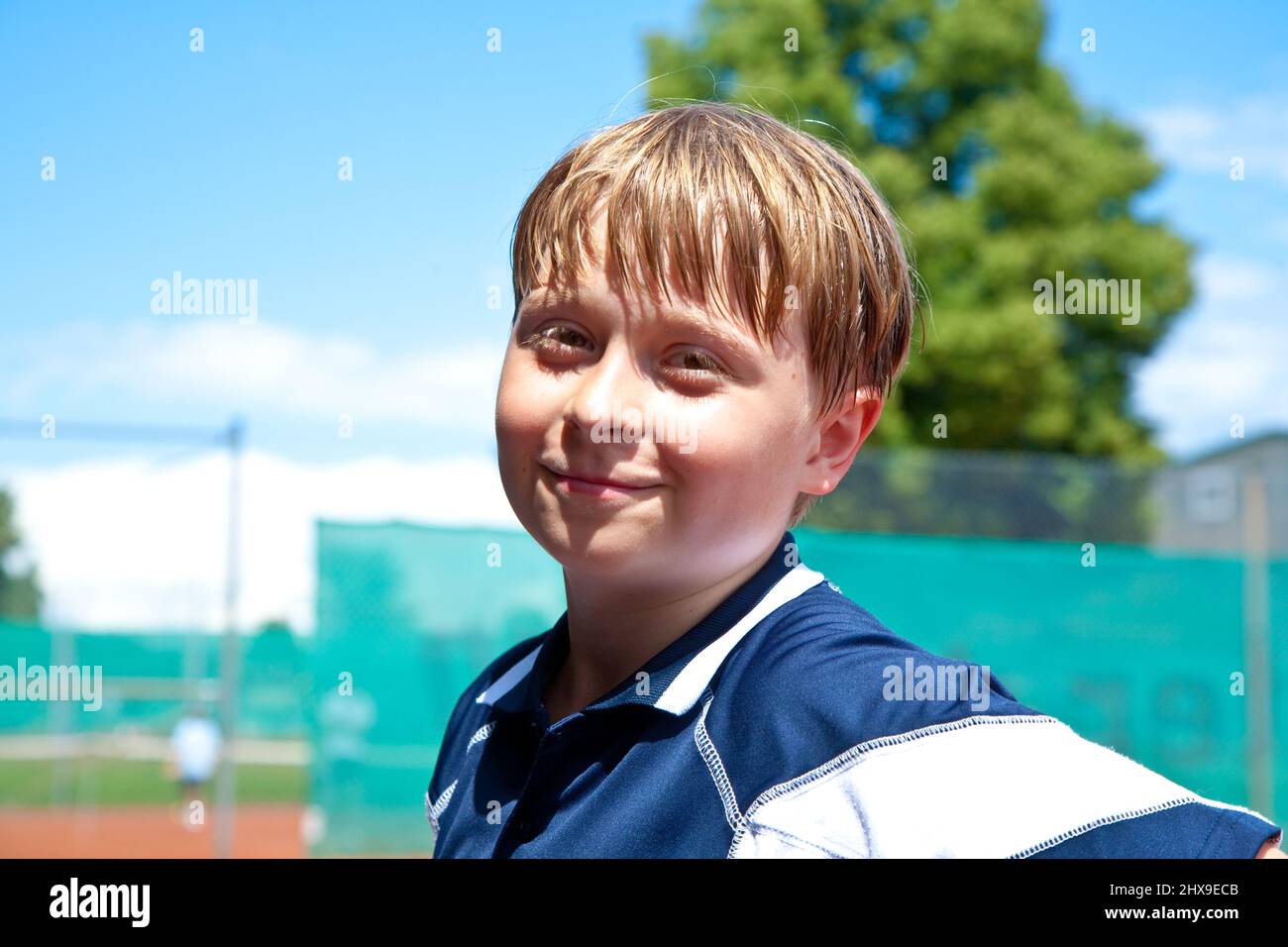 child looks happy and satisfied after the tennis match Stock Photo - Alamy