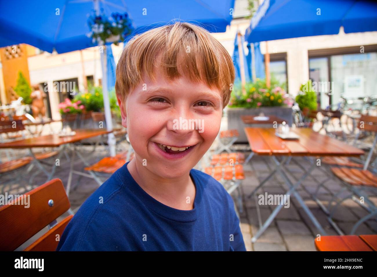 happy child smiles with full mouth and looks boldfaced and laughs Stock ...