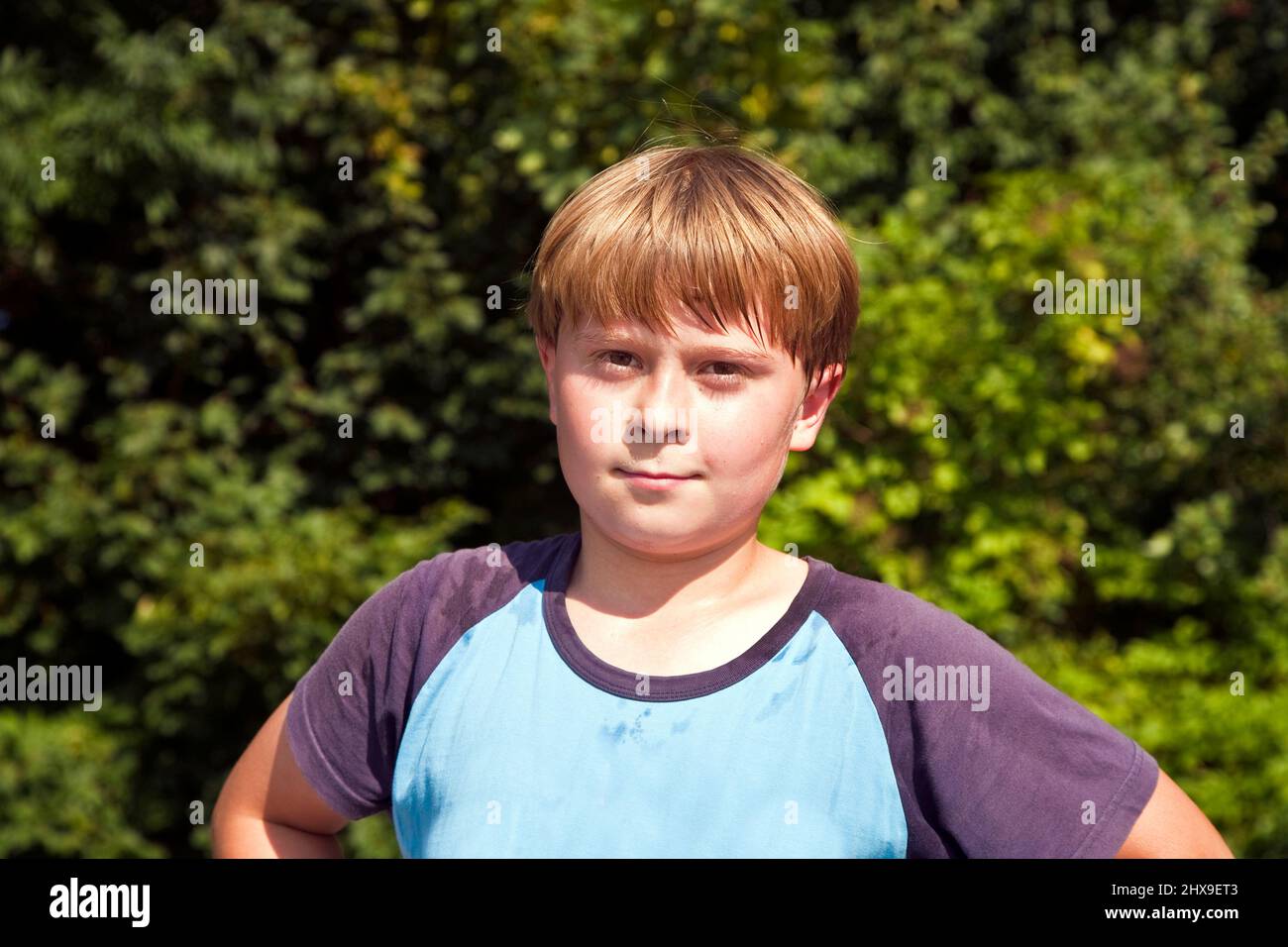 boy with sweating face after sport looks confident Stock Photo - Alamy