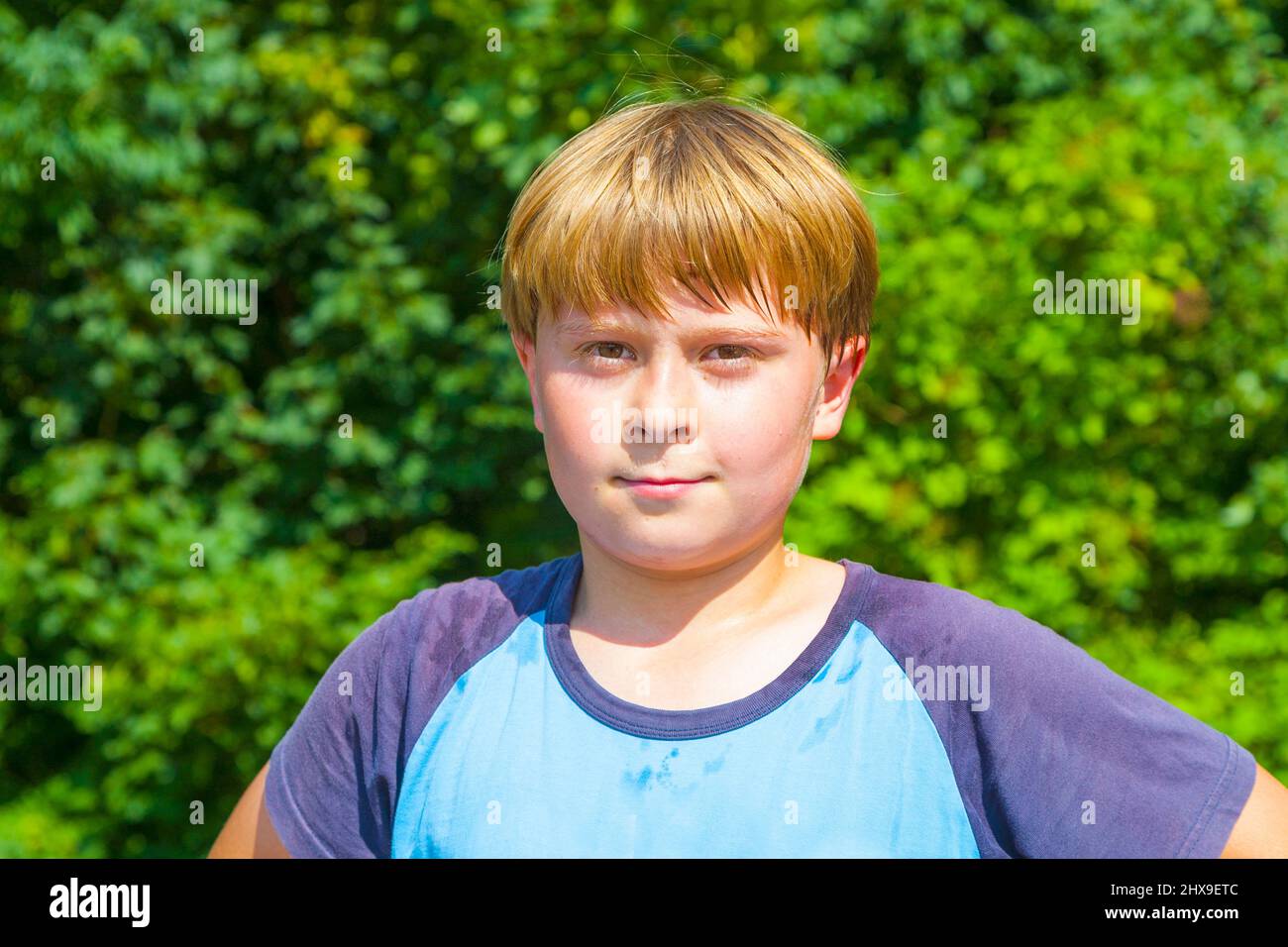boy with sweating face after sport looks confident Stock Photo - Alamy