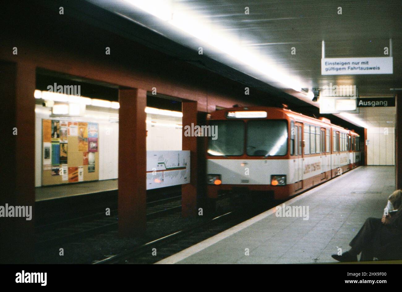 A subway train approaching an underground metro station stop in West ...