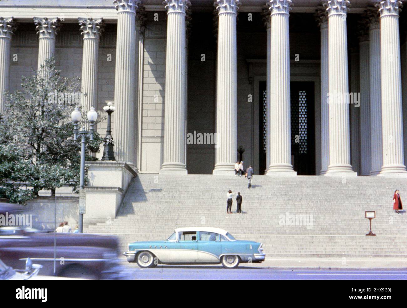 People walking up steps of National Archives building in Washington D.C ...