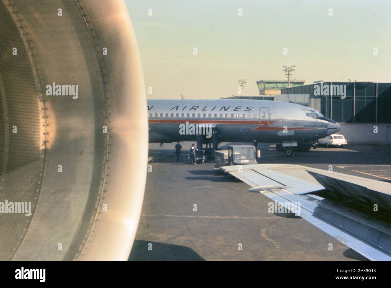 Unknown airlines company plane at a gate of an airport ca. 1969 Stock ...