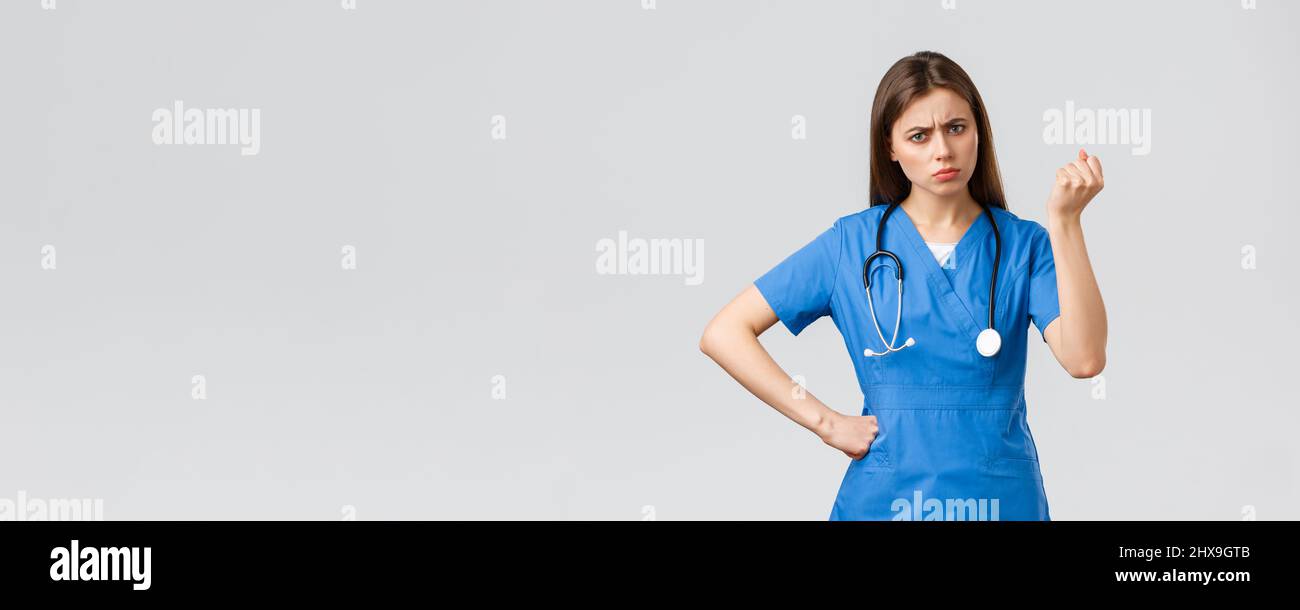 Medical workers, healthcare, covid-19 and vaccination concept. Angry ...