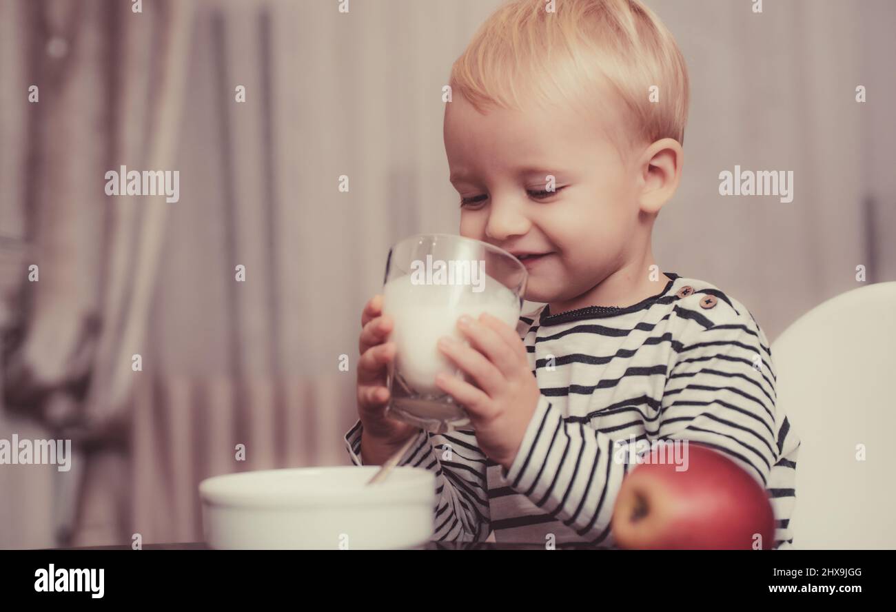 Healthy food. Boy cute baby eating breakfast. Baby nutrition. Eat ...