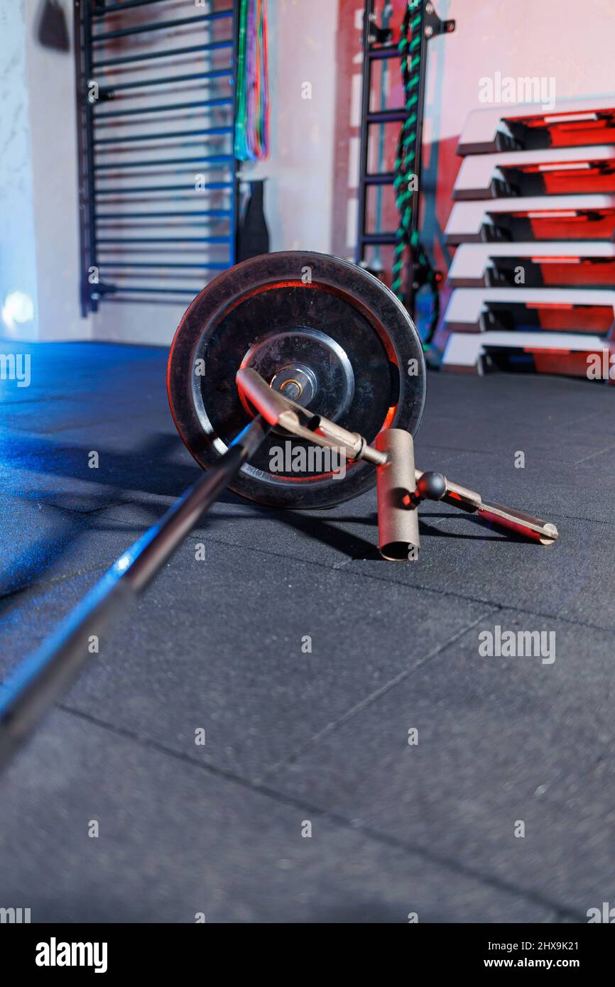 Sports equipment is on the floor in the gym. Close up view of sports ...