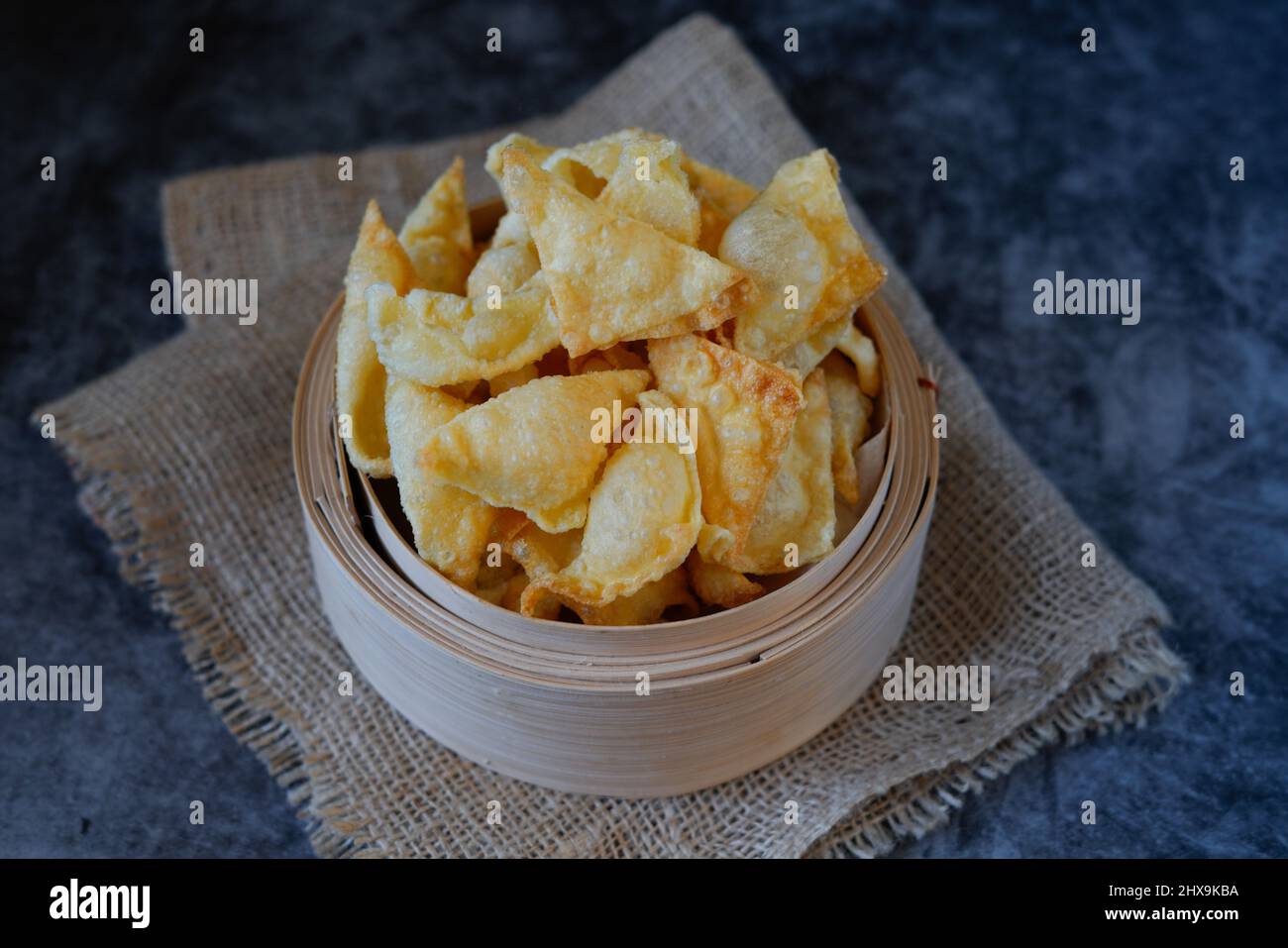 Pangsit goreng or fried wonton usually served with mie ayam chicken ...