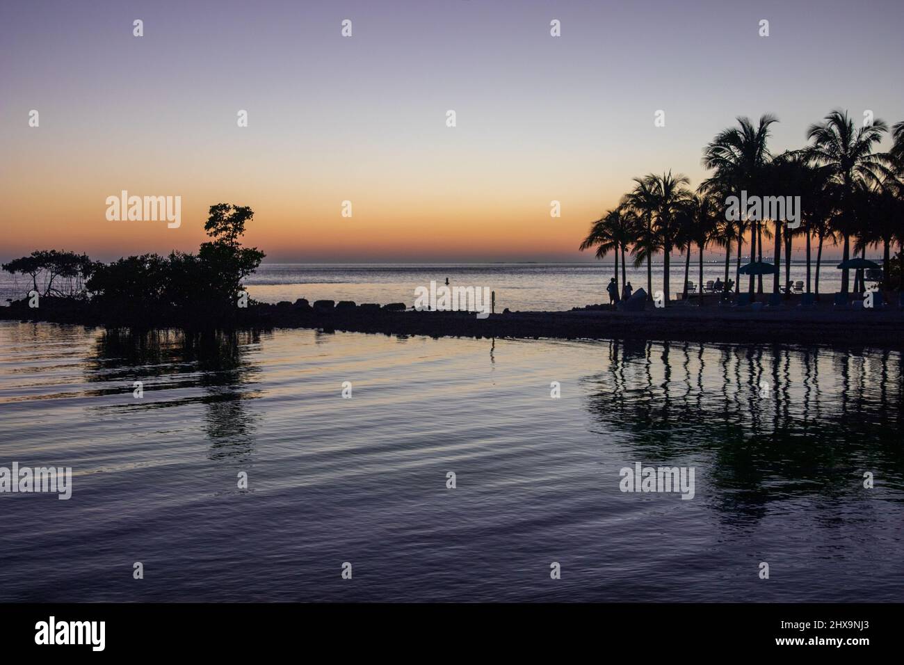 Tropical sunsets hi-res stock photography and images - Alamy