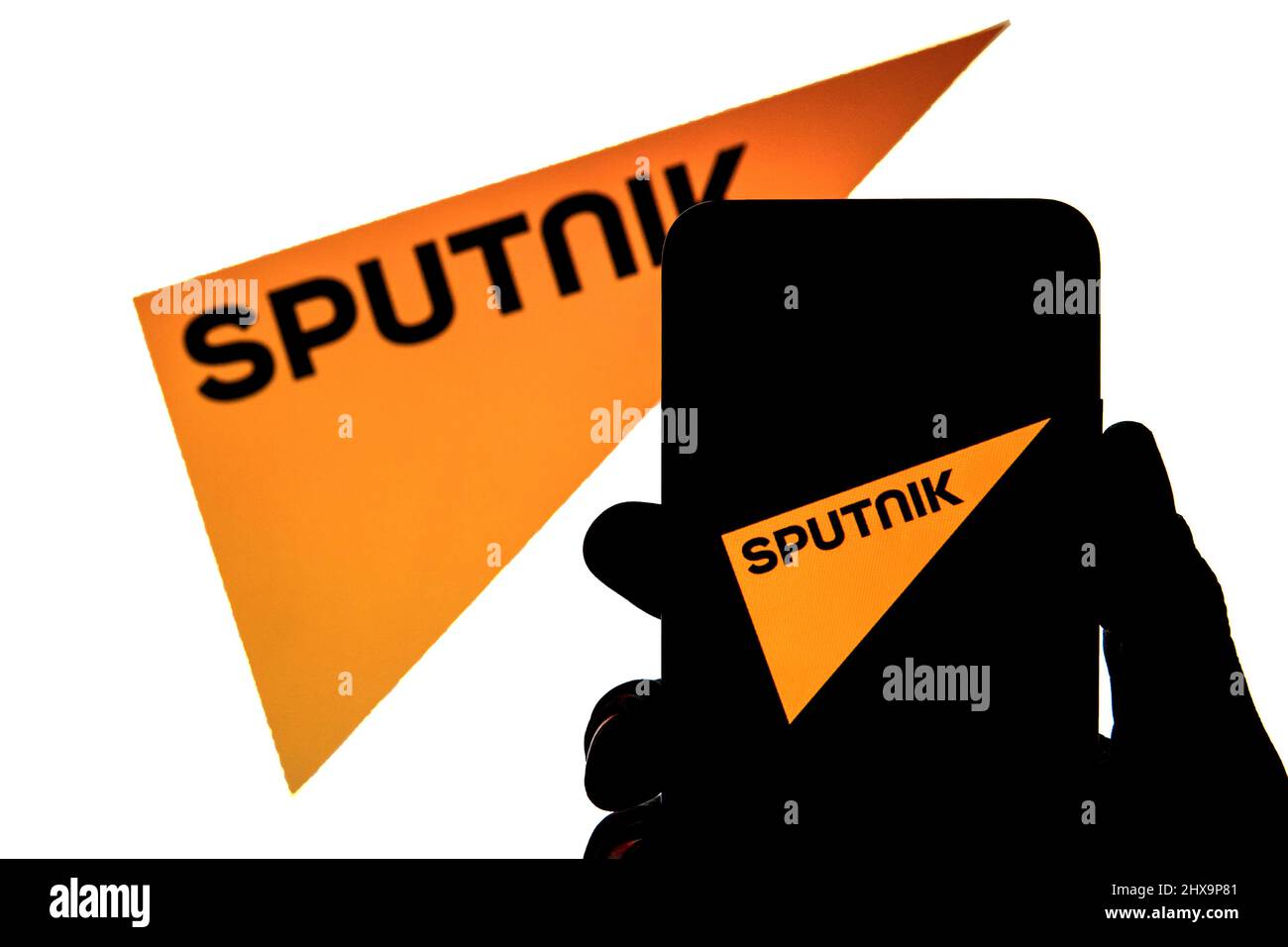 In this photo illustration a Sputnik logo seen displayed on a ...