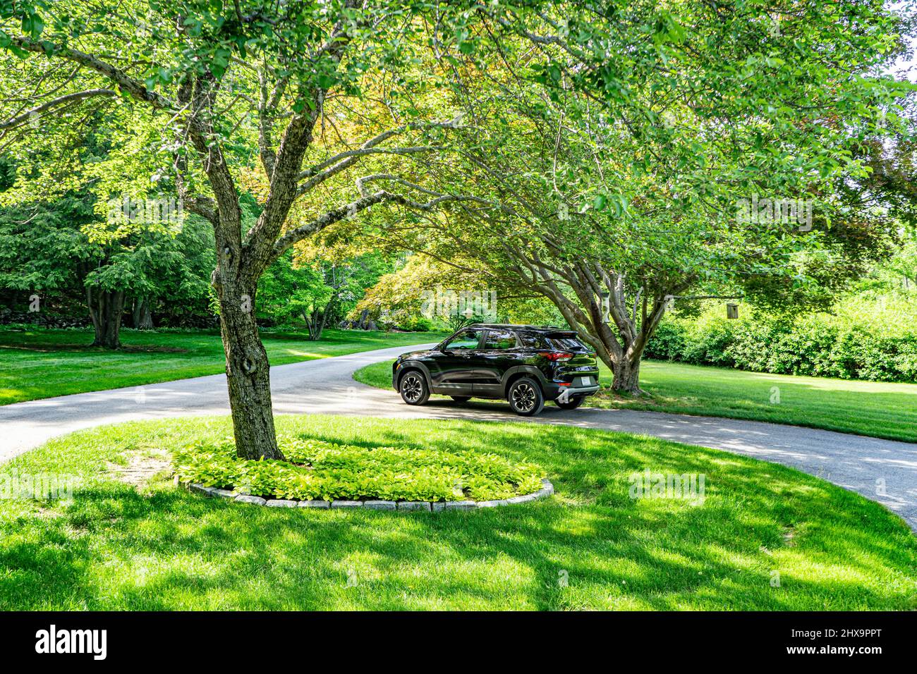 Car parked in Residential Driveway Stock Photo - Alamy