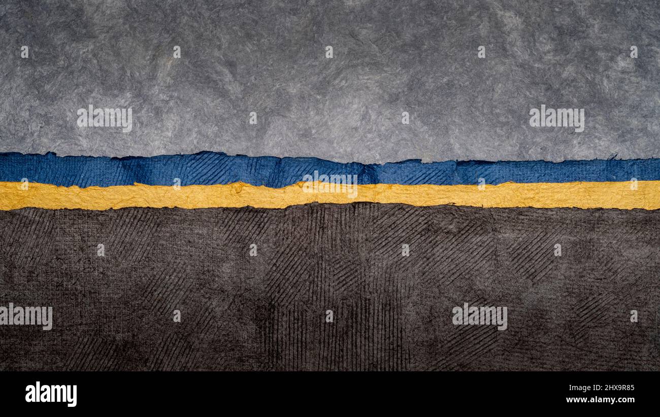 dark and gloomy landscape abstract with a narrow band of Ukraine blue ...