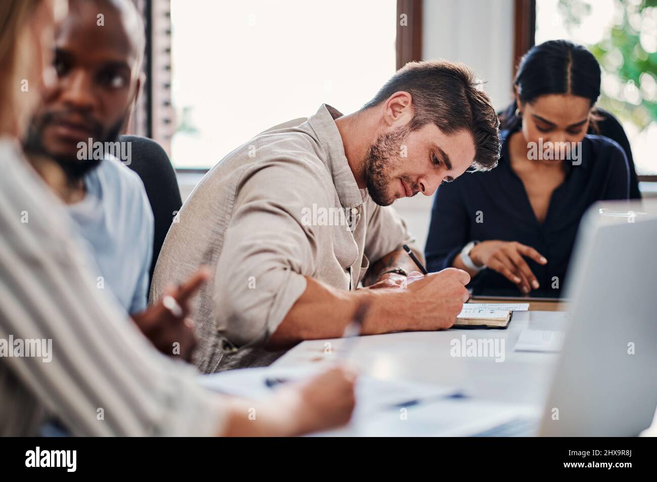 African man taking notes looking hi-res stock photography and images ...