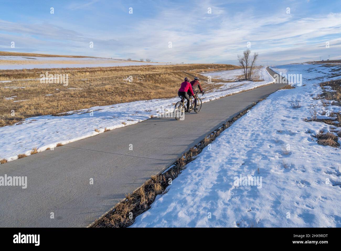 Fort Collins, CO, USA - February 12, 2022: A couple is riding a tandem ...