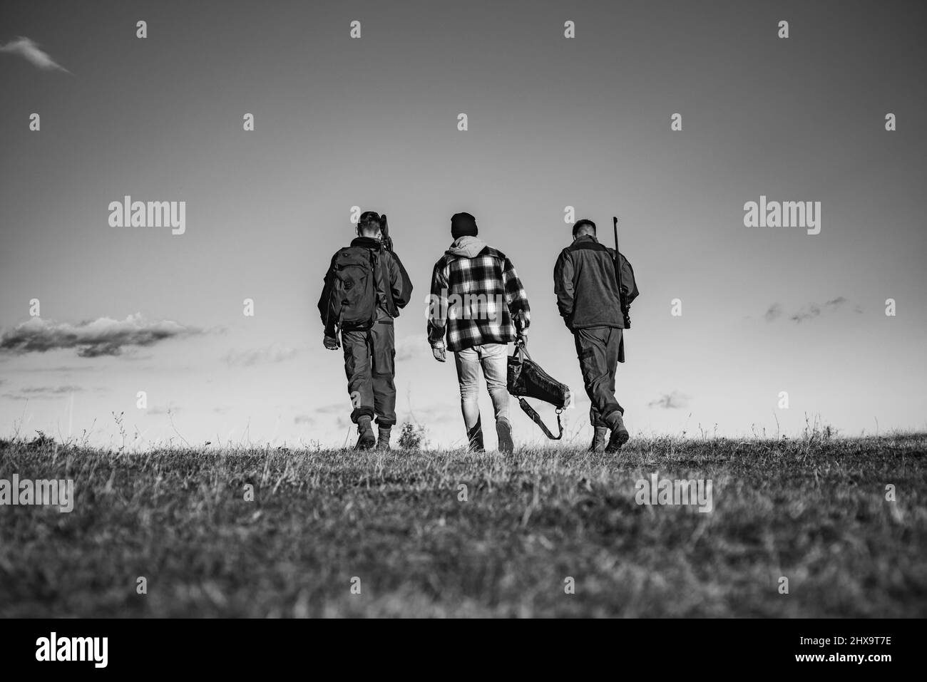 Hunters with shotgun gun on hunt. Closed and open hunting season. Track ...
