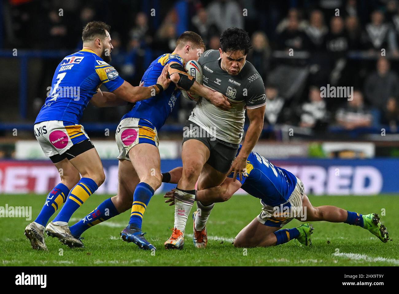 Andre Savelio (11) of Hull FC breaks the tackle of James Donaldson (25 ...