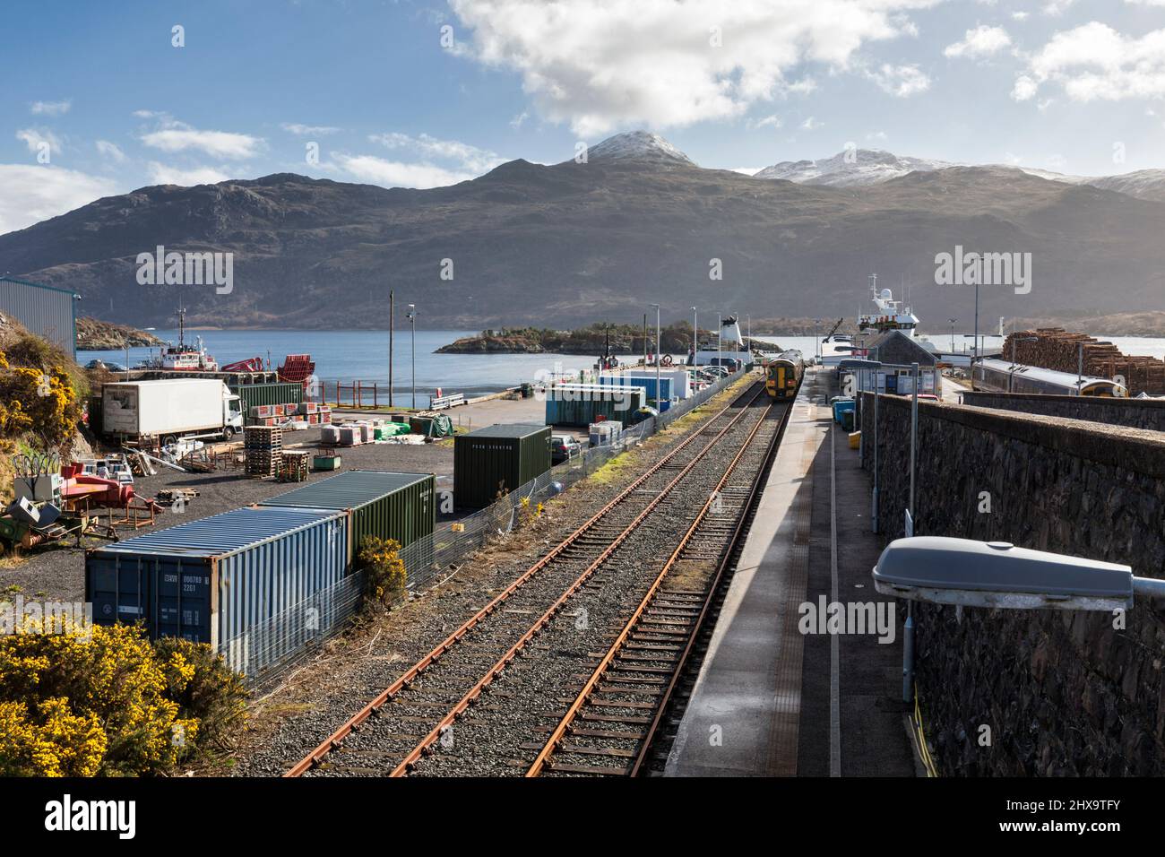 Kyle Of Lochalsh Railway station with the Isle of Skye behind and ...