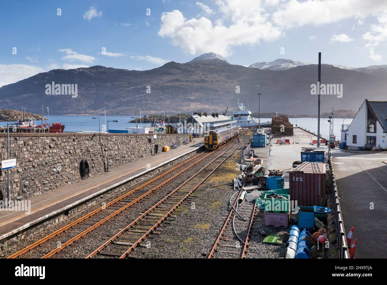 Kyle Of Lochalsh Railway station with the Isle of Skye behind and ...
