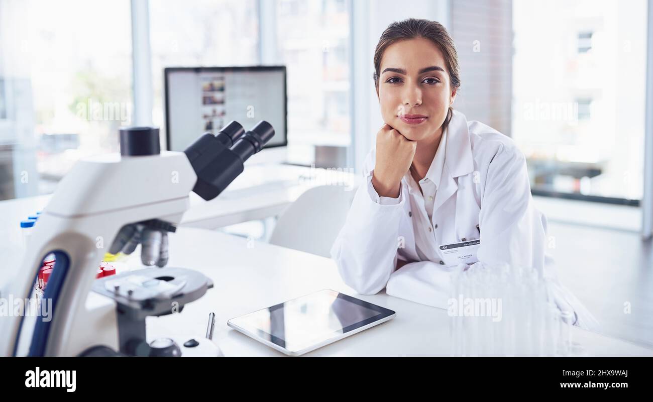 Confidence comes with hard work. Portrait of a confident young female ...