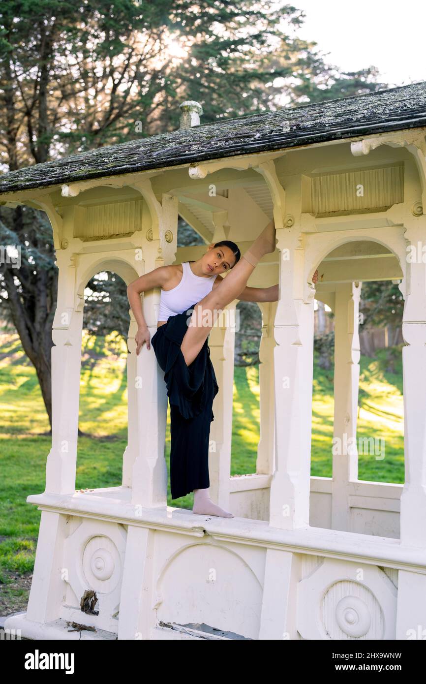 Multiracial Female Dancer | Dance Pose | White Victorian Gazebo Stock ...