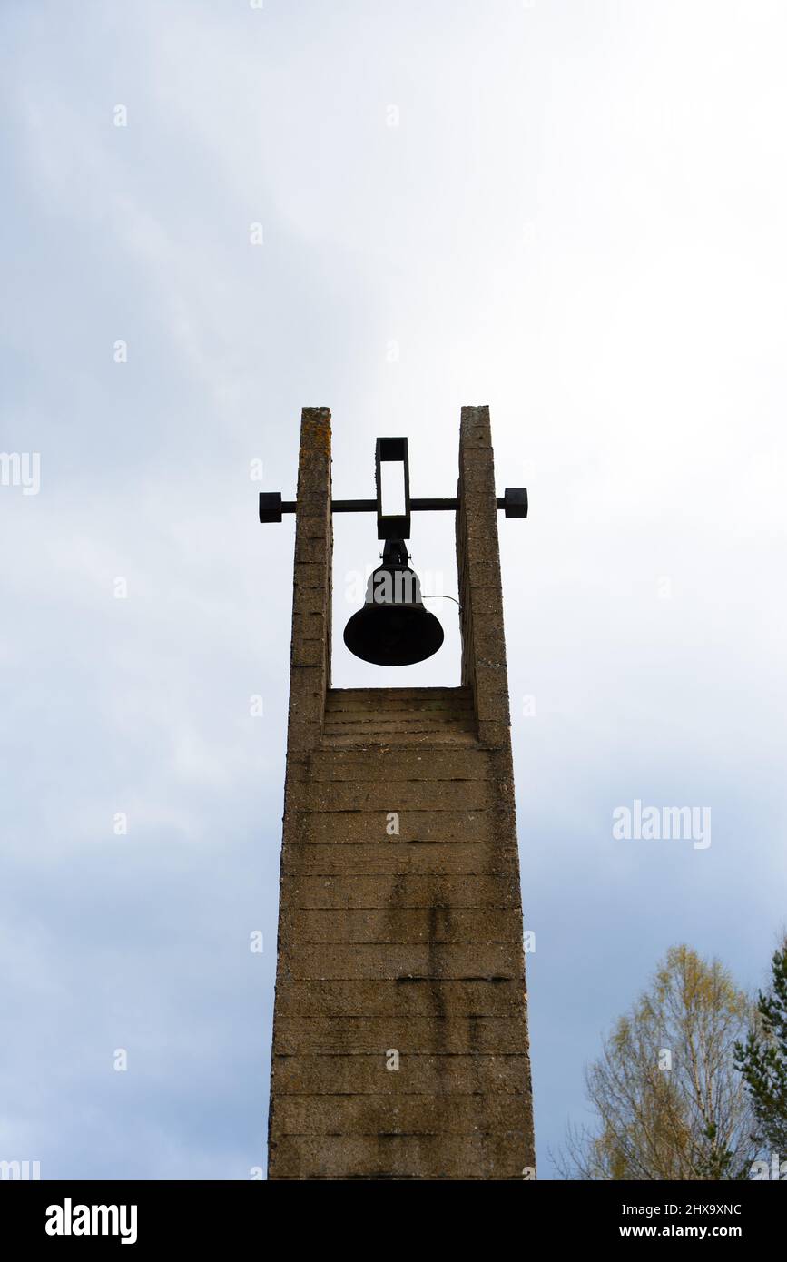 The bells in Khatyn with sky background. The cemetery of burned vilages ...