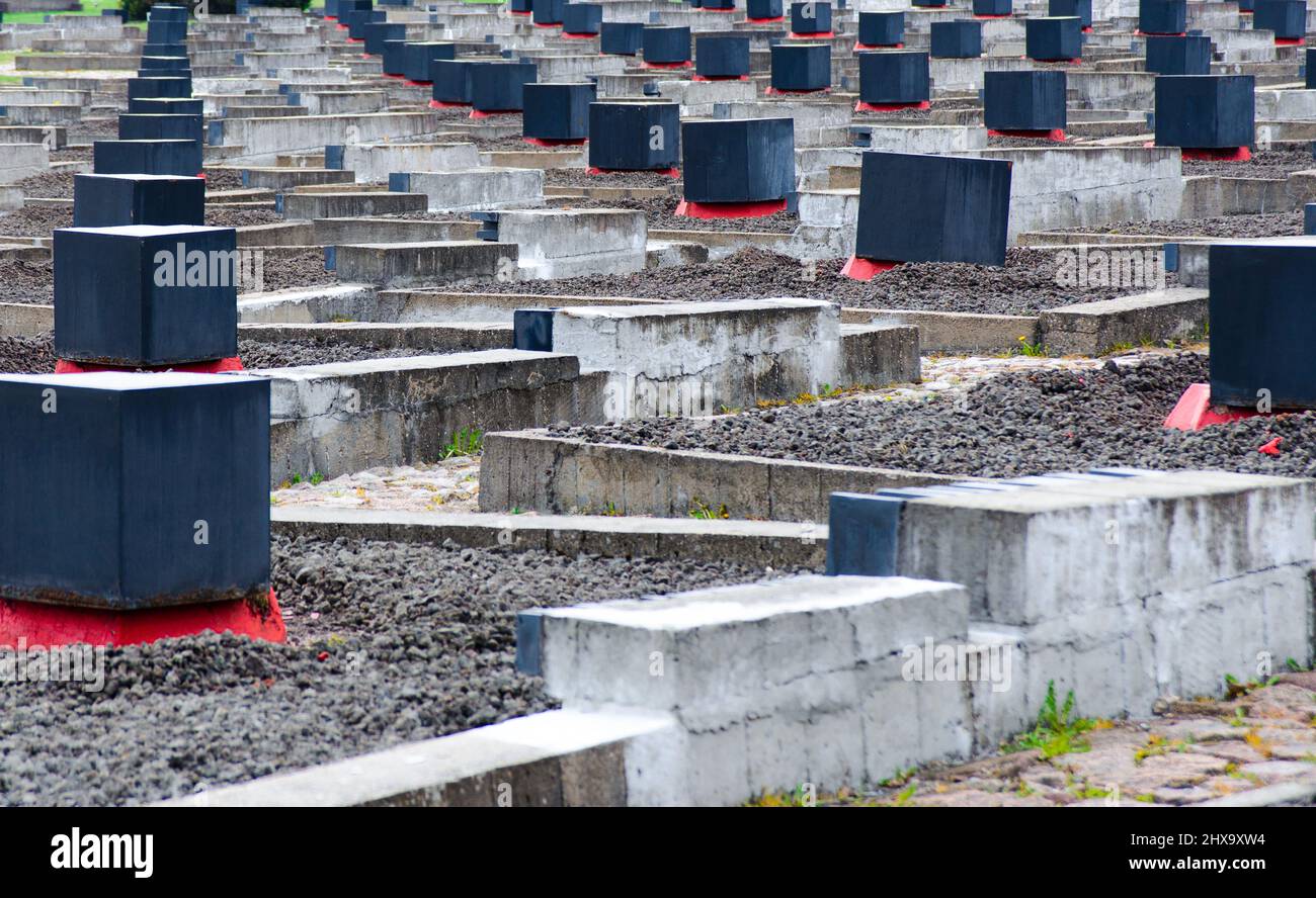 The bells in Khatyn with sky background. The cemetery of burned vilages ...
