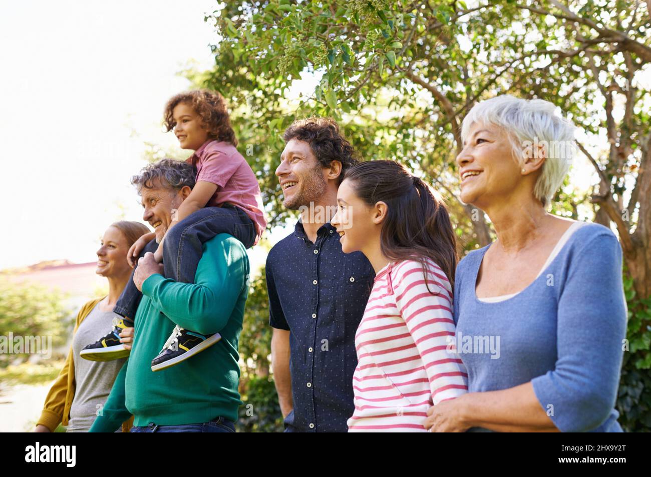 Family is important to them. Shot of a family standing outdoors in the ...