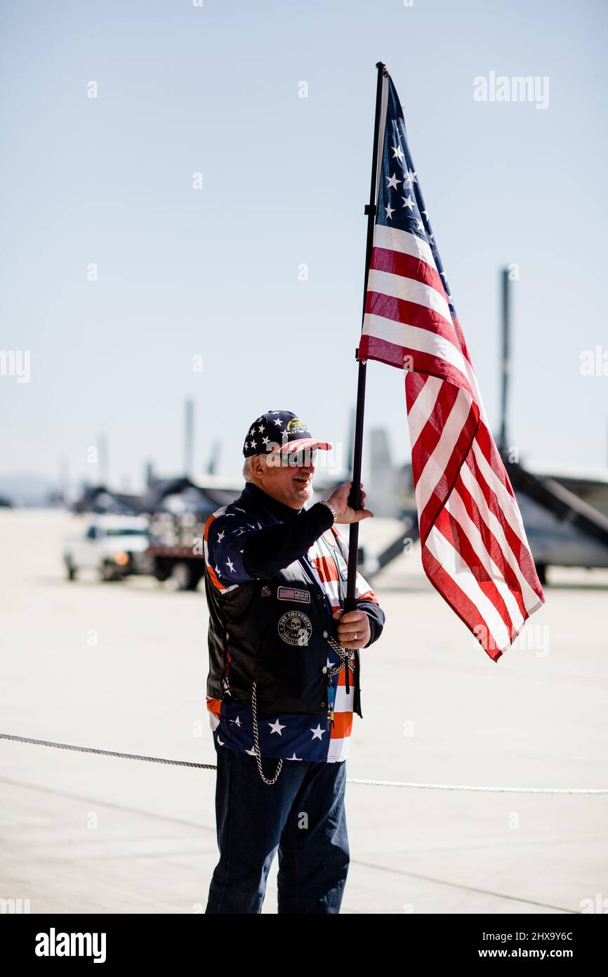 Military Vet Holding Flag for Returning Soldiers in San Diego Stock ...