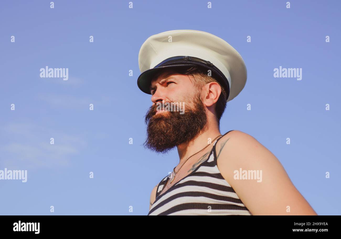Funny captain sailor wearing hat. Seaman fun. Portrait of serious ...