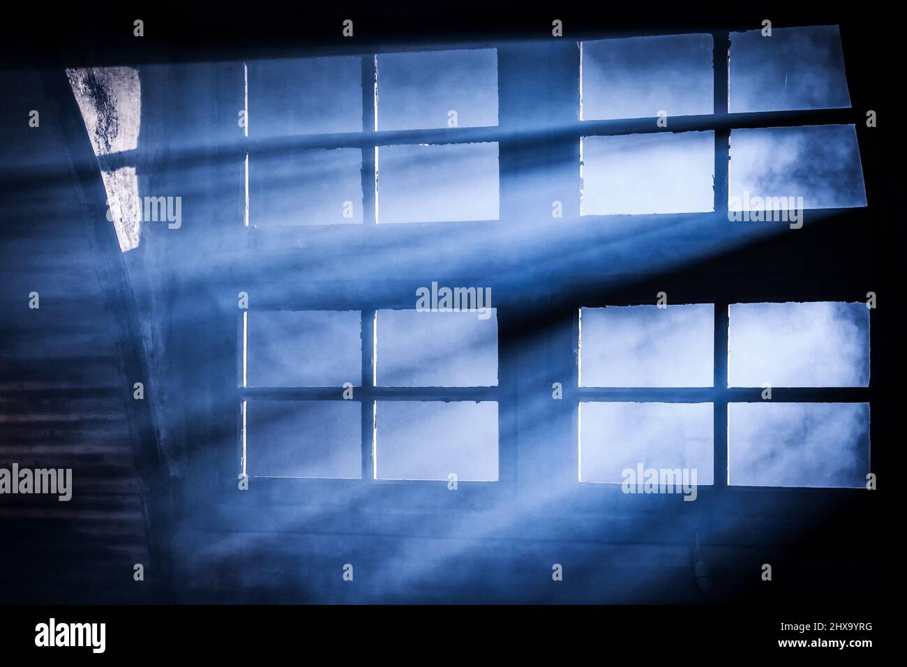 Light through a Smokey Room Window Stock Photo - Alamy