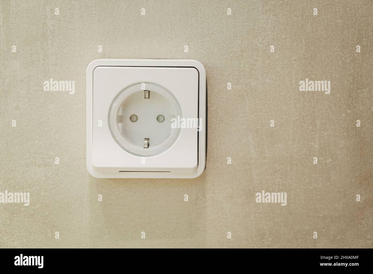 Power socket on the empty marble wall Stock Photo - Alamy