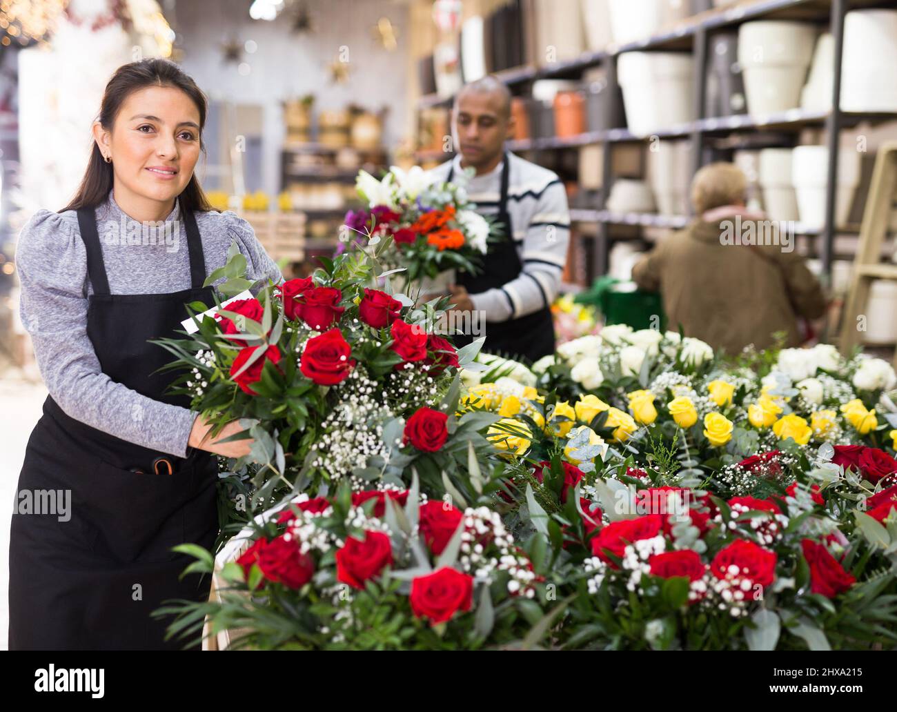 Professional florist woman creates hi-res stock photography and images ...
