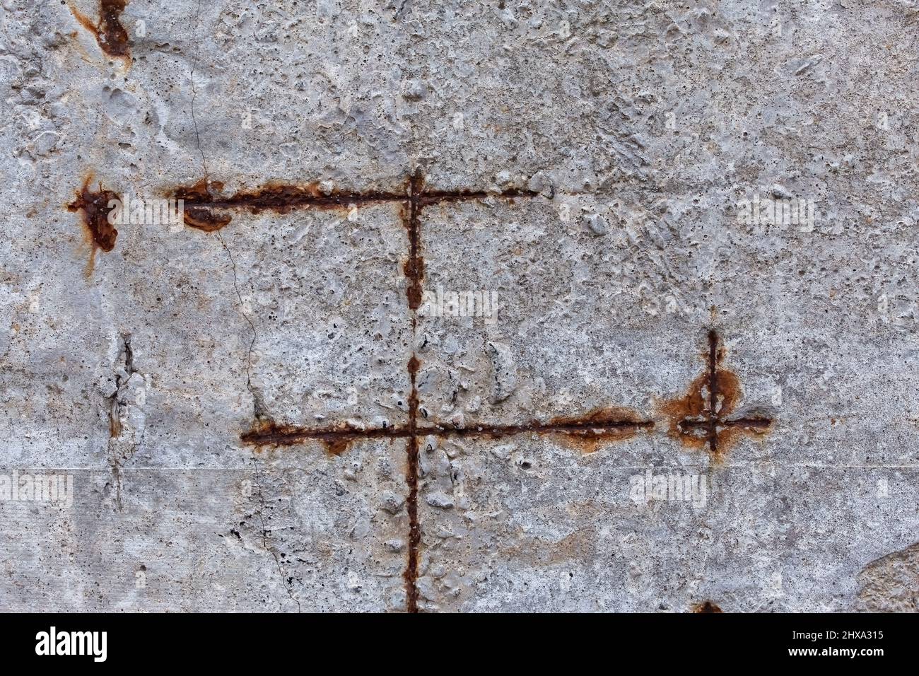 Macro fragment of an old gray concrete wall with rusty rebar. Material ...