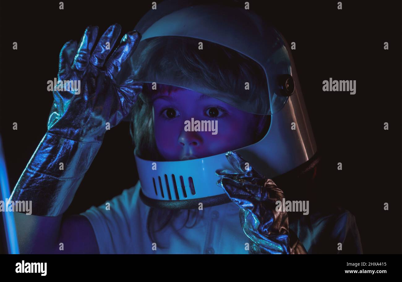Kid boy exploring space. Portrait of cute kids in space suits ...