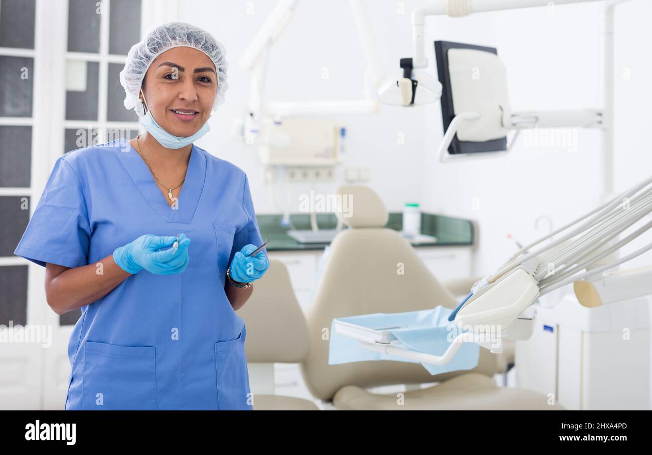 Successful professional woman dentist standing in dental office Stock ...