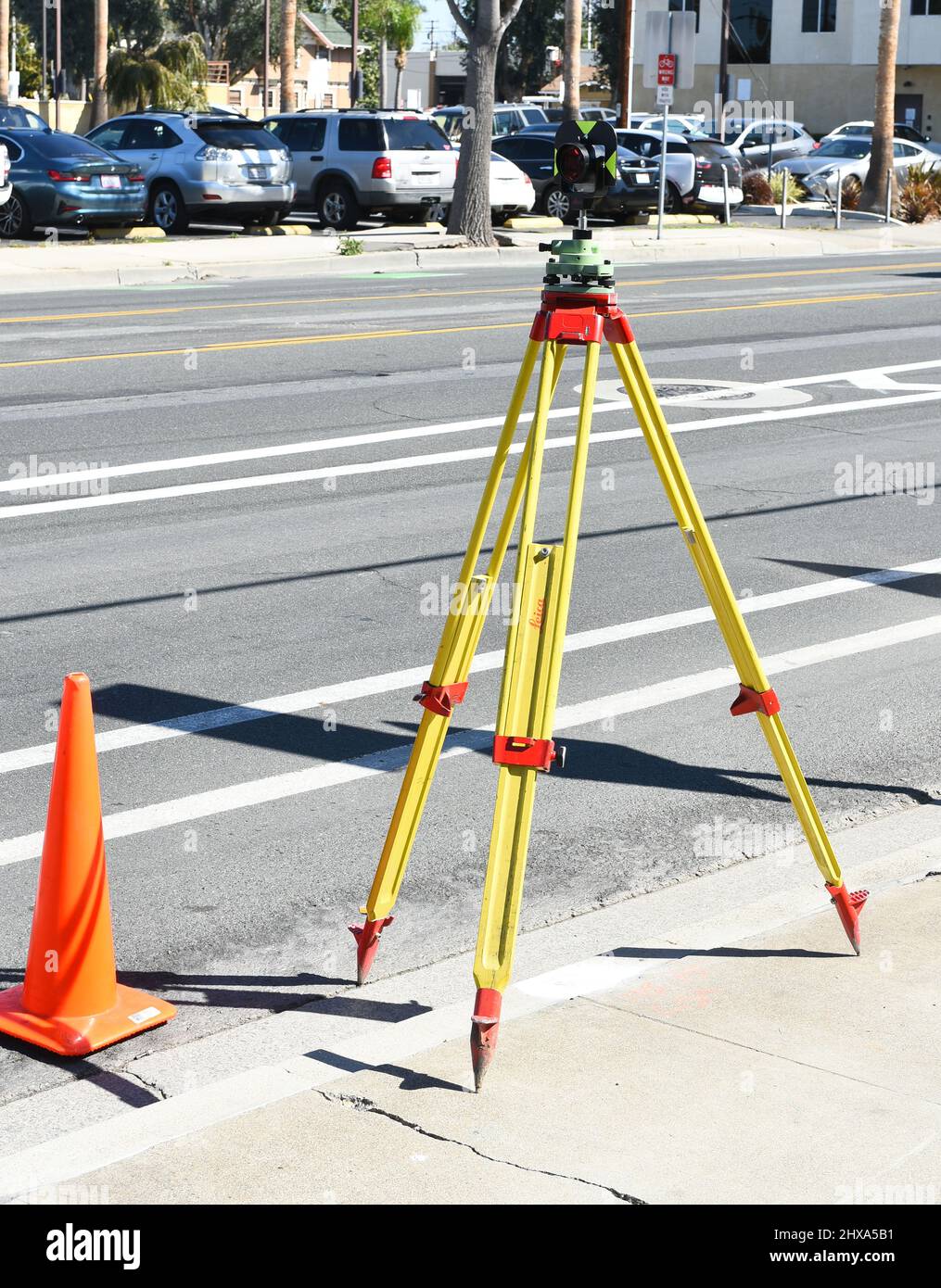 SANTA ANA, CALIFORNIA - 9 MAR 2022: Surveyors equipment in the street ...