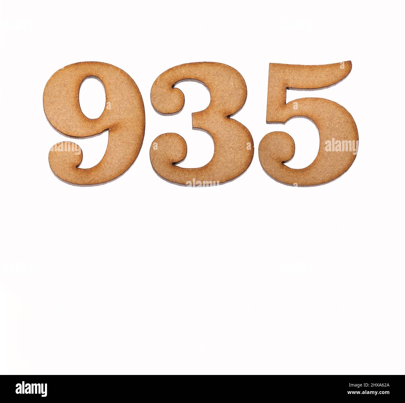 Number 935 in wood, isolated on white background Stock Photo - Alamy