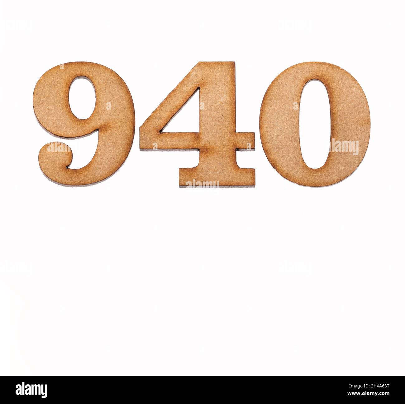 Number 940 - Piece of wood isolated on white background Stock Photo - Alamy